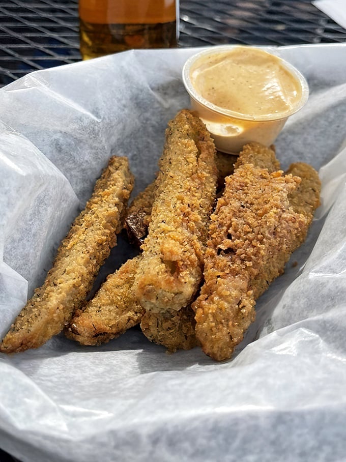 Fried pickle spears: The snack you didn't know you needed until now. Crunchy, tangy perfection that makes you question all other appetizers.