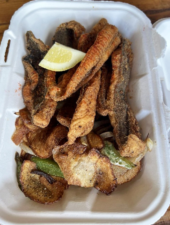 Fried flounder so perfectly cooked it makes you want to high-five strangers. That crispy exterior giving way to flaky fish is nature's perfect contrast.