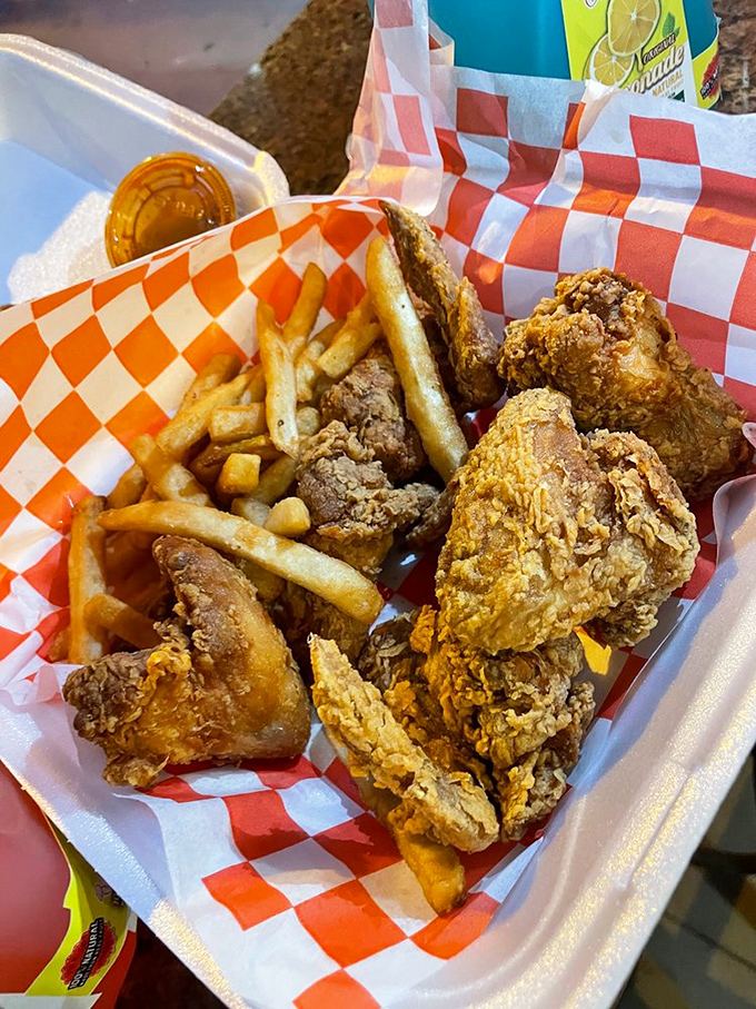 Behold the Harold's money shot&mdash;perfectly fried chicken and fries with that signature sauce drizzle. Poetry doesn't always rhyme; sometimes it crunches.