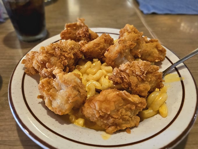 Crispy chicken bites nestled against mac and cheese &ndash; a partnership more perfect than Astaire and Rogers, and considerably more delicious.