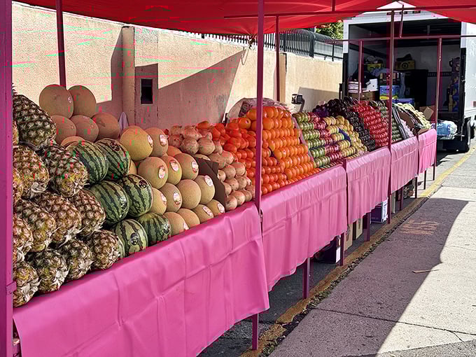 Nature's candy arranged in spectacular, Instagram-worthy pyramids. This fruit stand brings farmers market freshness to the swap meet experience.