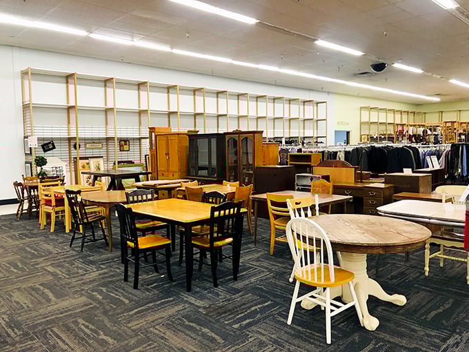 Dining sets wait patiently for their next Thanksgiving dinner. That pedestal table has probably hosted more meaningful conversations than most therapists' offices.