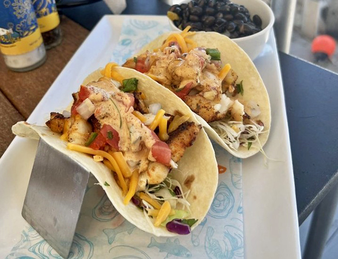 Fish tacos that make you question every other taco decision in your life. The grouper practically high-fives your taste buds with each bite.
