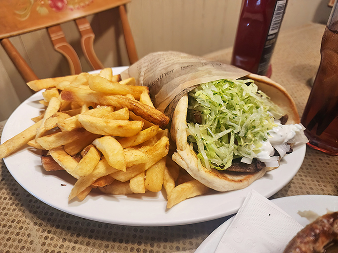 A proper gyro should require strategic eating and napkin reinforcements. This one, with its mountain of fresh-cut fries, checks all the delicious boxes.