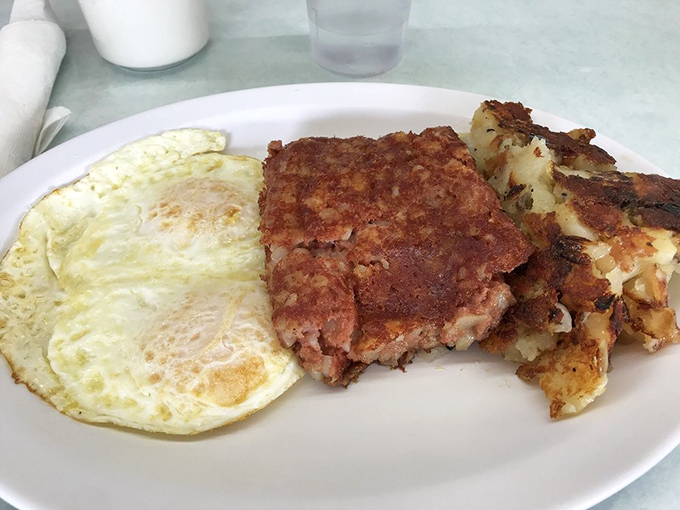 Hash browns done right alongside eggs that know exactly how to behave on your plate.