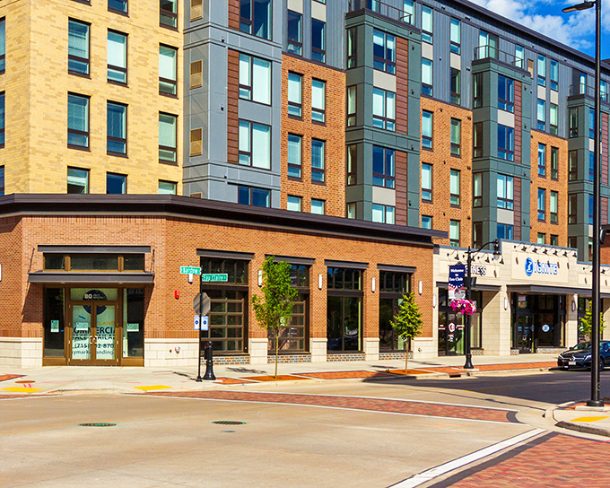 Haymarket Landing represents Eau Claire's renaissance, with street-level businesses supporting apartments above. Urban living with small-town soul&mdash;the best of both worlds.