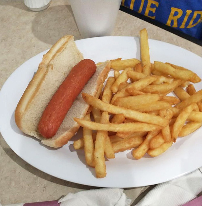 The hot dog and fries combo&mdash;proof that sometimes the simplest pleasures are the ones that never let you down.