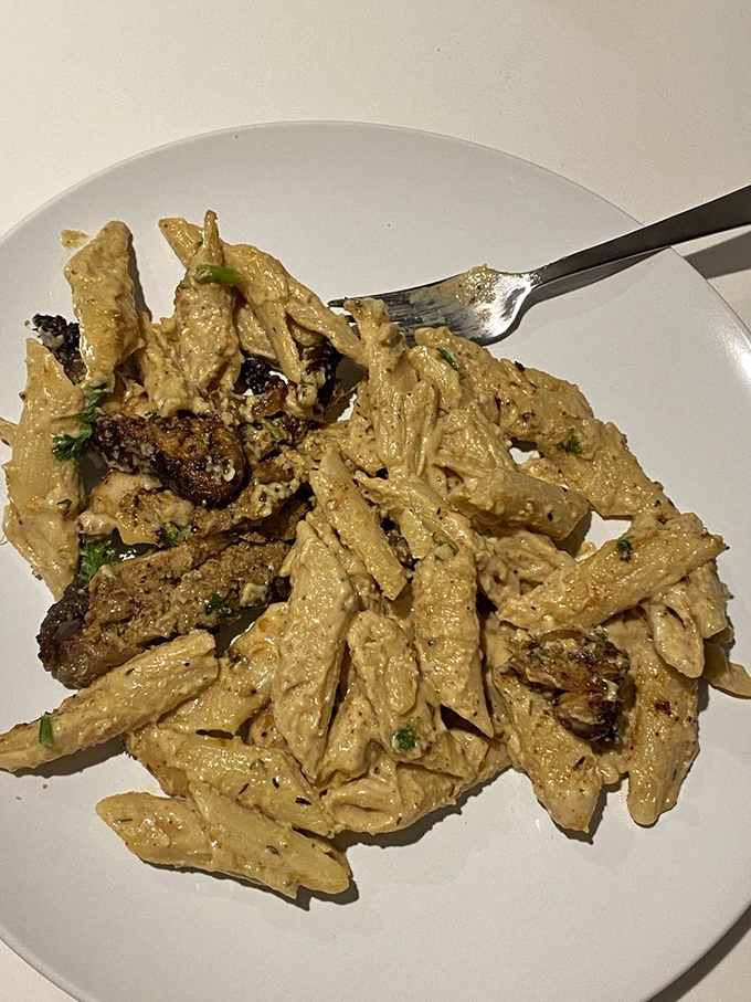 Pasta that's dressed better for a night out than most of us, coated in a sauce worth breaking your diet for.