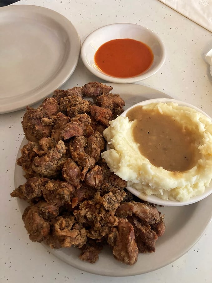 These pan-fried livers and gizzards with mashed potatoes might make you rethink the parts of chicken you've been avoiding all these years.