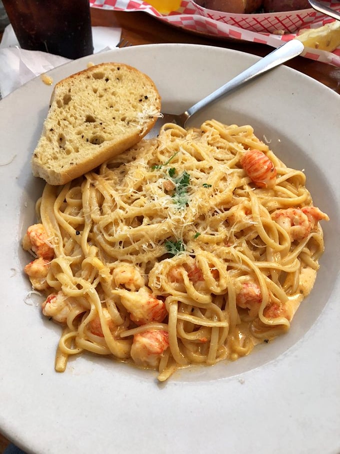 The legendary shrimp pasta &ndash; where perfectly cooked linguine meets plump shrimp in a sauce worth sopping up with every last crumb of bread.