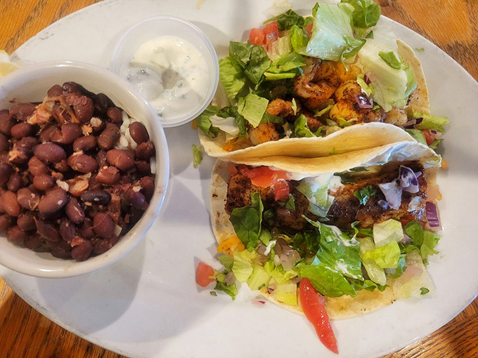 Tacos that tell a story of the ocean. Each bite delivers a perfect balance of spice, crunch, and that "why can't I make this at home?" flavor.