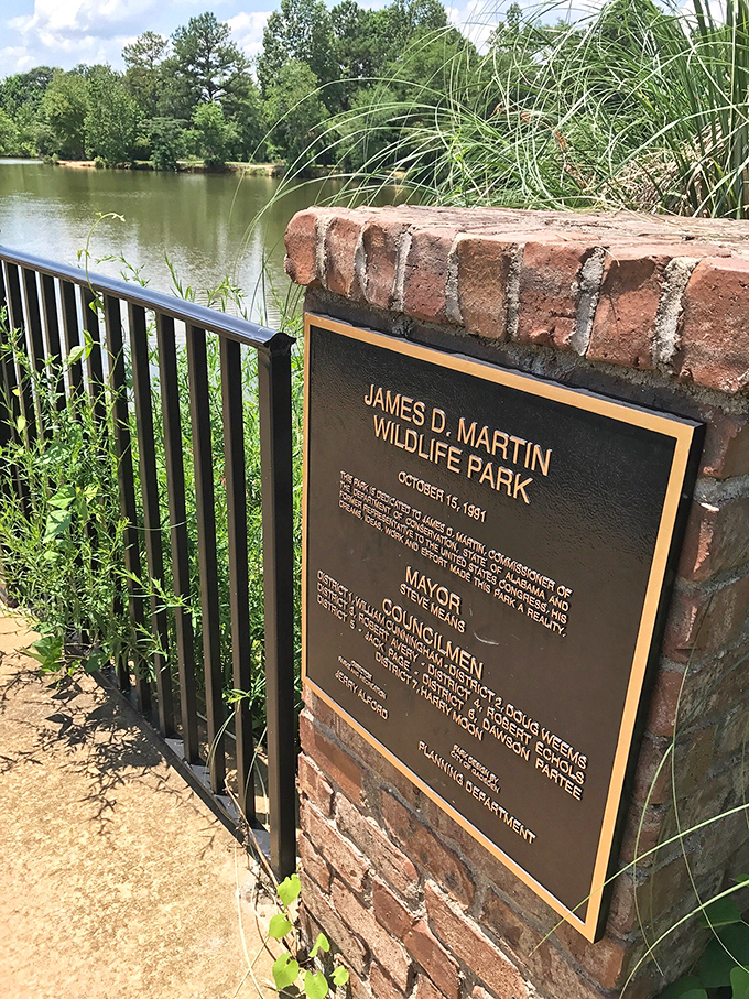 The entrance to James D. Martin Wildlife Park promises adventures in biodiversity, where boardwalks lead visitors into wetland ecosystems teeming with native species.