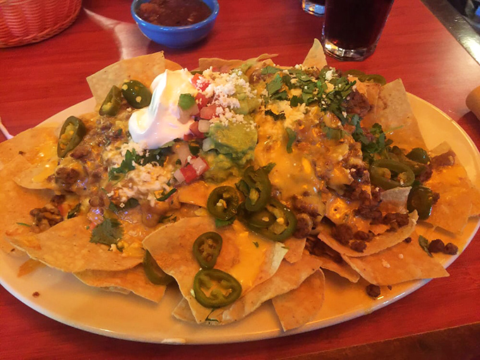 Layer upon glorious layer of chips, cheese, and toppings&mdash;like a geological formation that proves God wants us to be happy.