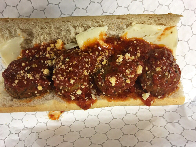 These meatballs aren't just swimming in sauce&mdash;they're doing the backstroke in a pool of red gravy worthy of Olympic gold.