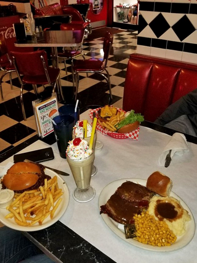 Green beans, mashed potatoes, and gravy-smothered meatloaf &ndash; the holy trinity of diner cuisine. Those rolls aren't just sitting there, they're calling your name.
