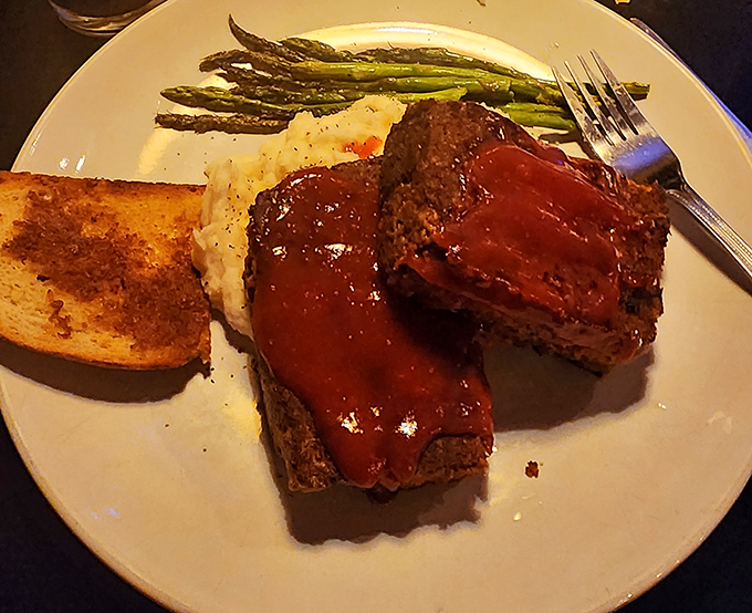 Meatloaf, mashed potatoes, and perfectly roasted asparagus&mdash;the holy trinity of comfort food, executed with respect and zero pretension.