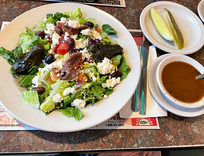 A Greek salad that brings Mediterranean sunshine to upstate New York&mdash;crisp greens, briny olives, and feta cheese crumbles that transport you straight to Athens.