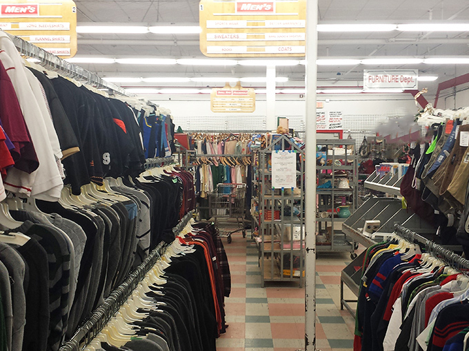 Men's clothing arranged with military precision, a rainbow of possibilities. Finding that perfect blazer feels like winning a small lottery.