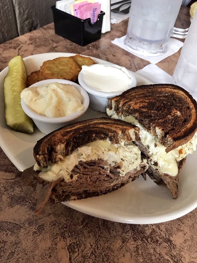 This isn't just a sandwich—it's the Mohawk Reuben, where marble rye meets tender meat in a marriage that would make any deli proud.
