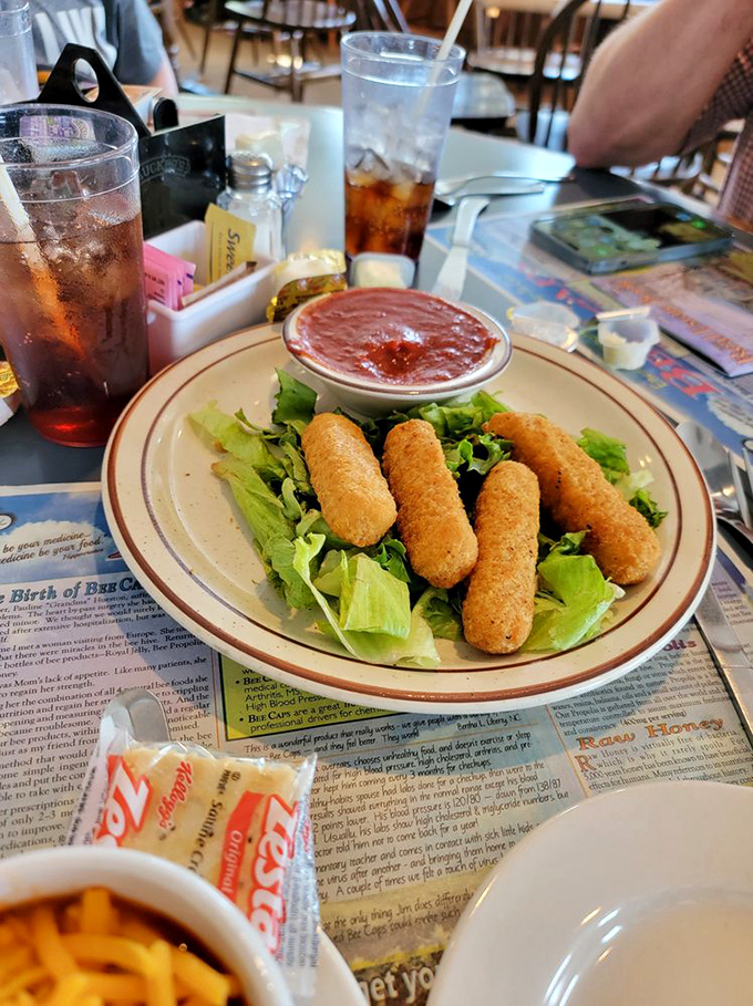 These golden mozzarella sticks aren't just appetizers; they're crispy vessels delivering molten cheese straight to your happiness center.