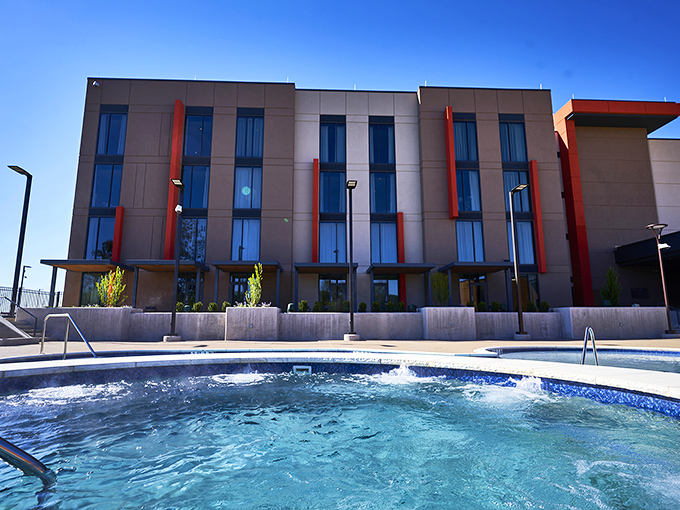 The sleek Osage Casino Hotel brings contemporary comfort to the prairie, its clean lines and azure pool a surprising oasis amid rolling hills.