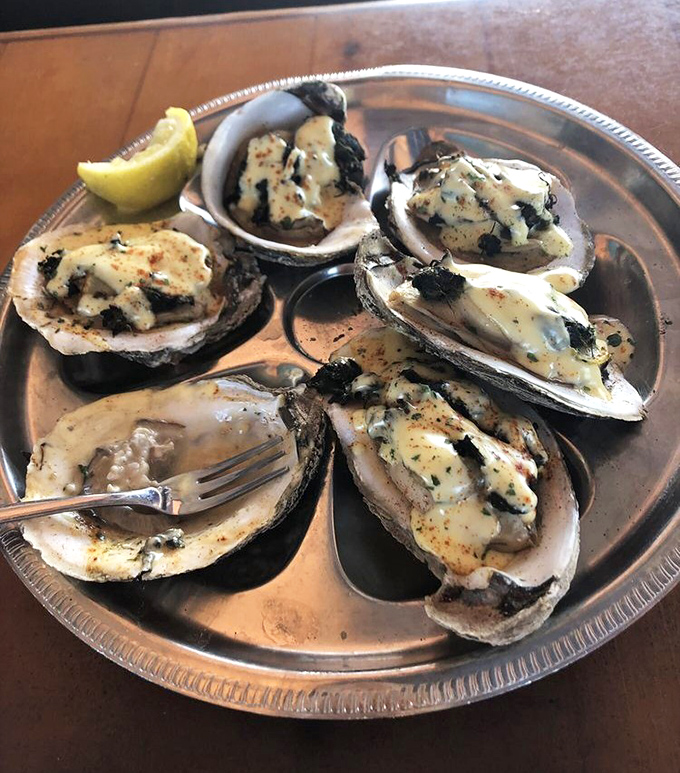 These oysters Rockefeller aren't just appetizers; they're little boats of buttery, herby goodness sailing straight to your happy place.
