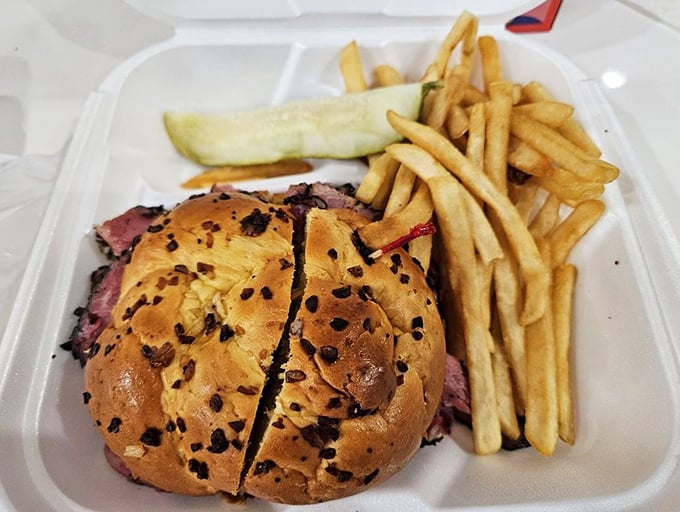 Pastrami royalty on a throne of onion roll. This sandwich doesn't just satisfy hunger &ndash; it creates memories with every succulent, peppery bite.