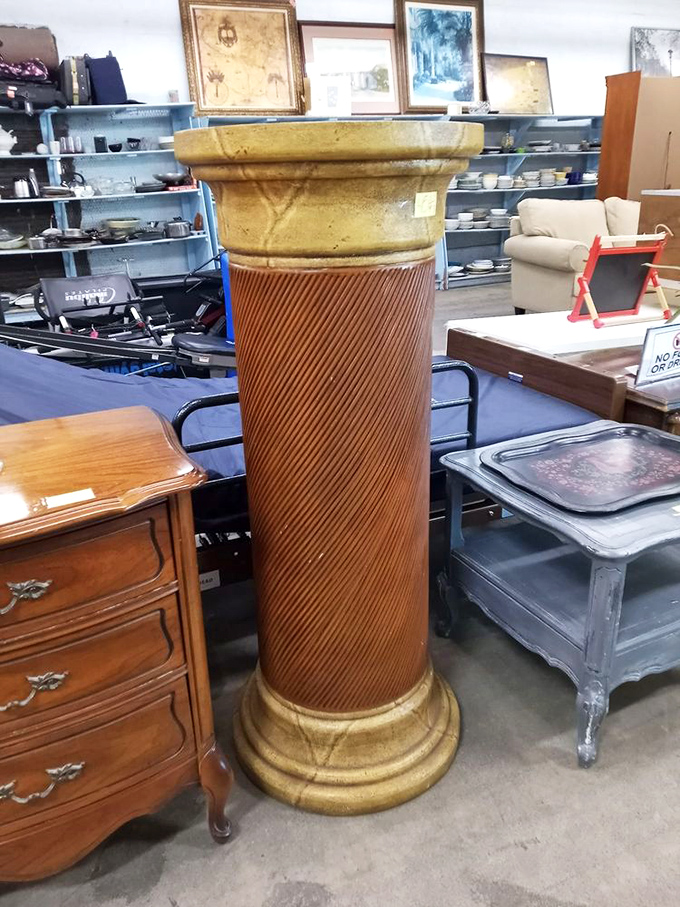 This decorative pedestal stands ready to elevate whatever treasure you decide deserves a place of honor.