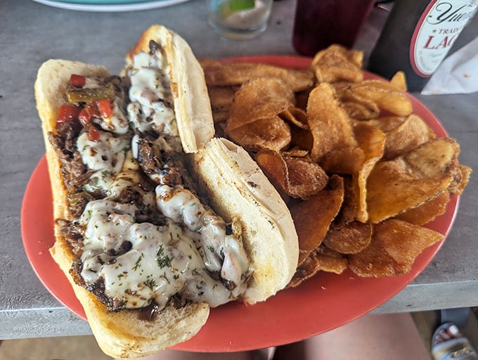 That moment when melted cheese meets perfectly seasoned beef in a handheld miracle. The house-made chips aren't sidekicks&mdash;they're co-stars.