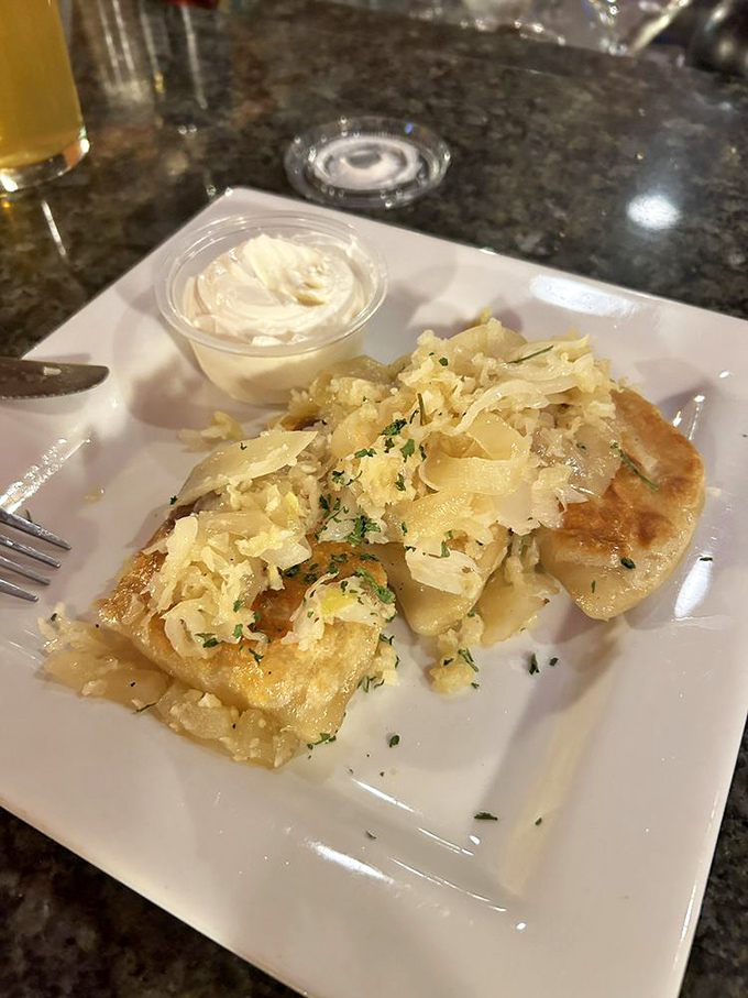 Pierogies that would make Eastern European babushkas nod in approval, topped with caramelized onions and herbs that elevate potato pockets to art form.