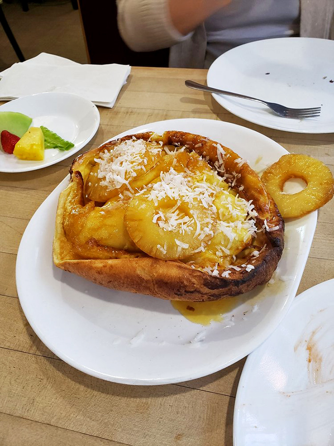 Pineapple paradise on a plate &ndash; where tropical fruit meets golden pancake in a vacation for your taste buds, no passport required.