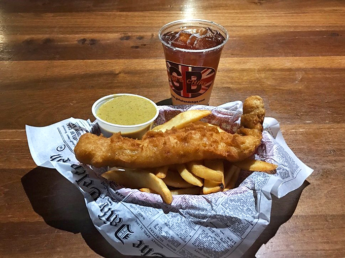 A golden-battered pollock fillet with chips and curry sauce&mdash;proof that sometimes the best vacation is the one you take with your taste buds.