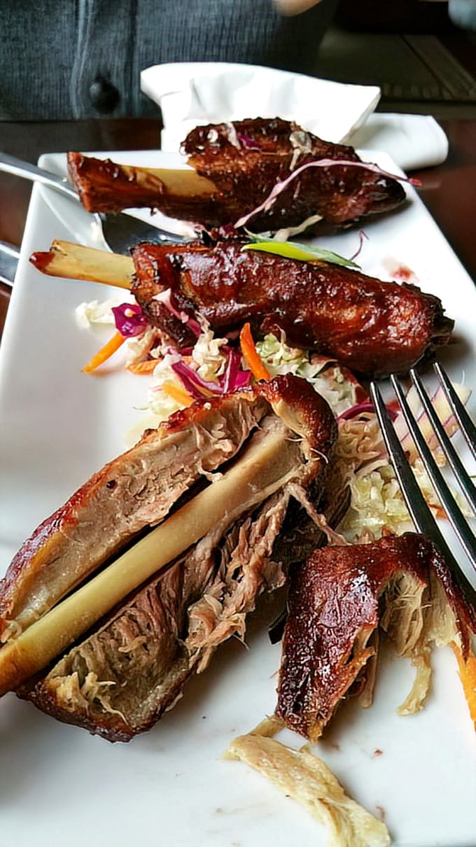 These aren't wings from any ordinary bird&mdash;glazed pork "wings" offer a primal pleasure, the meat surrendering from the bone with just the gentlest tug.