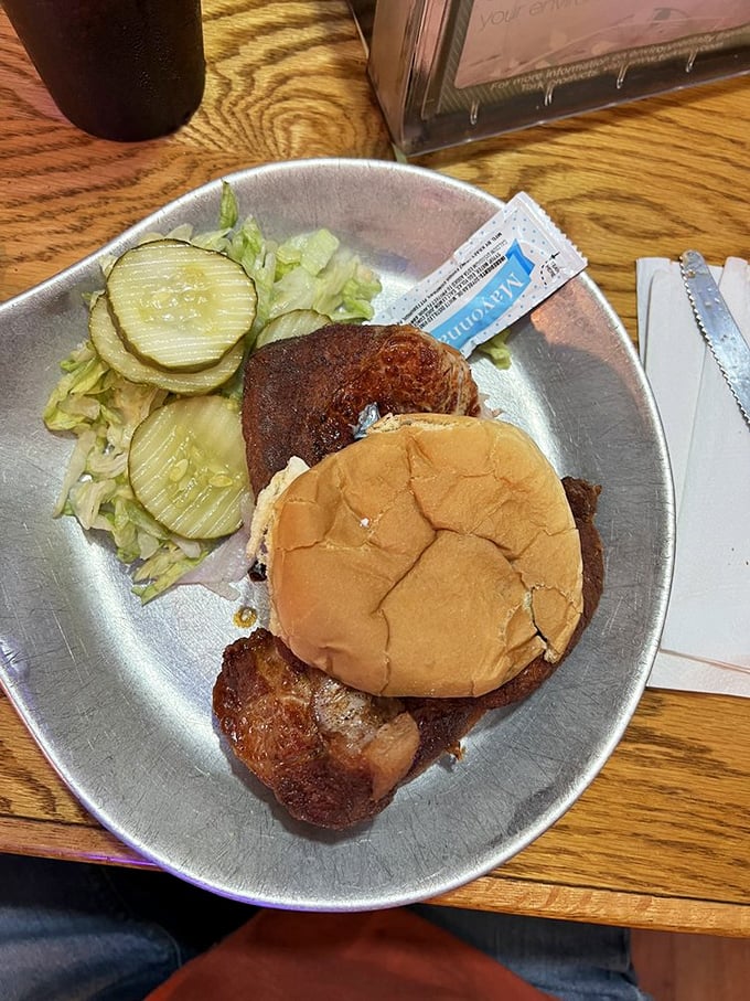 A pork chop sandwich that doesn't need fancy frills—just honest cooking and a soft bun. Simplicity that speaks volumes about Midwestern food philosophy.