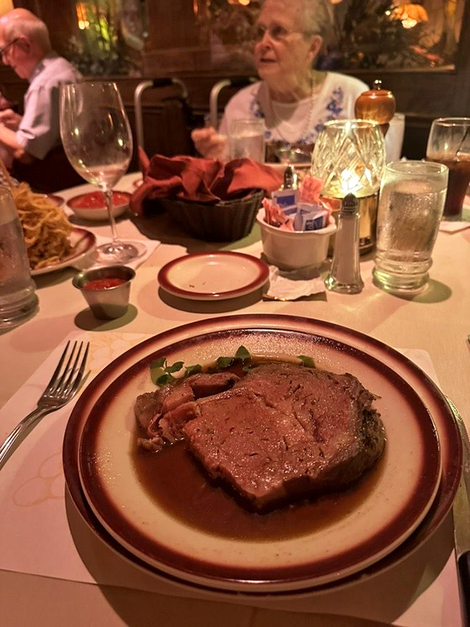 Prime rib so perfectly pink it could make a vegetarian question their life choices. The kind of meat that demands a moment of reverent silence.