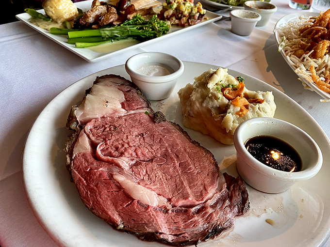 Prime rib so perfectly pink it could make a vegetarian question their life choices. The au jus cup isn't optional&mdash;it's essential supporting cast. 