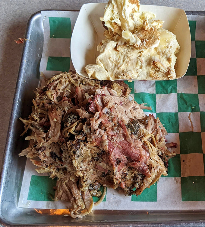Pulled pork that doesn't need a fork to pull&mdash;it surrenders willingly after hours in the smoker, accompanied by what appears to be heavenly potato salad.