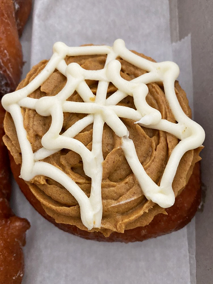The pumpkin cream cheese donut wears its web of icing like a couture dress&mdash;elegant, deliberate, and destined to be devoured.