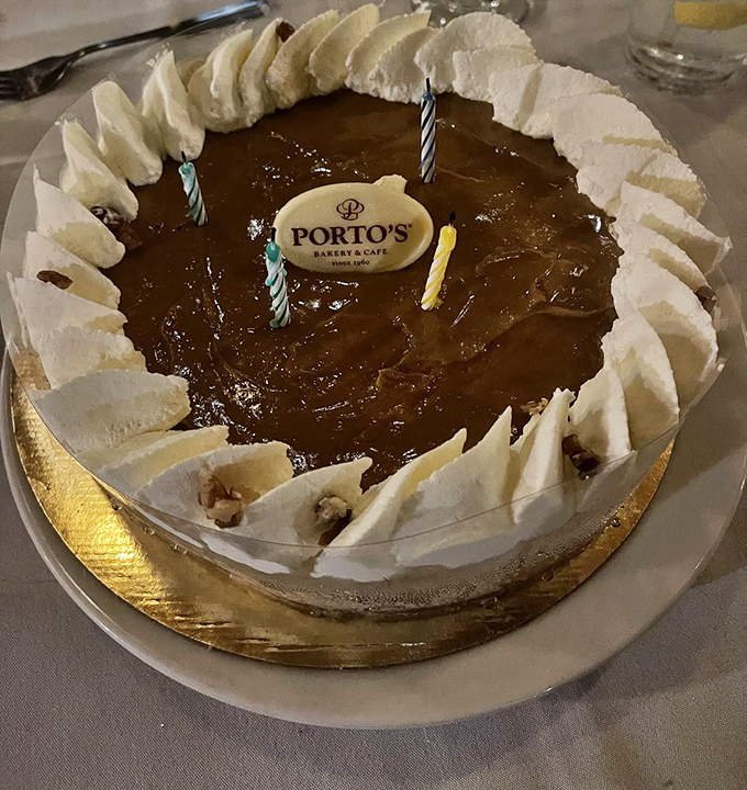 A celebration in cake form&mdash;Porto's pumpkin cheesecake with birthday candles proves that growing older deserves something creamier than wisdom.