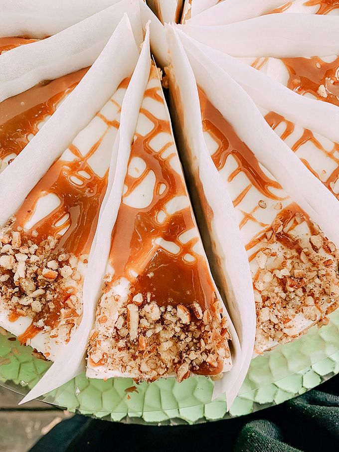 Architectural genius in dessert form&mdash;layers of creamy filling, crunchy toppings, and caramel drizzle that would make Frank Lloyd Wright jealous.