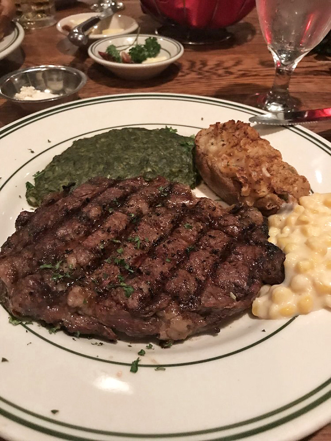 A ribeye that's been kissed by fire and blessed by butter. The spinach and Yorkshire pudding are just supporting actors in this meaty drama.