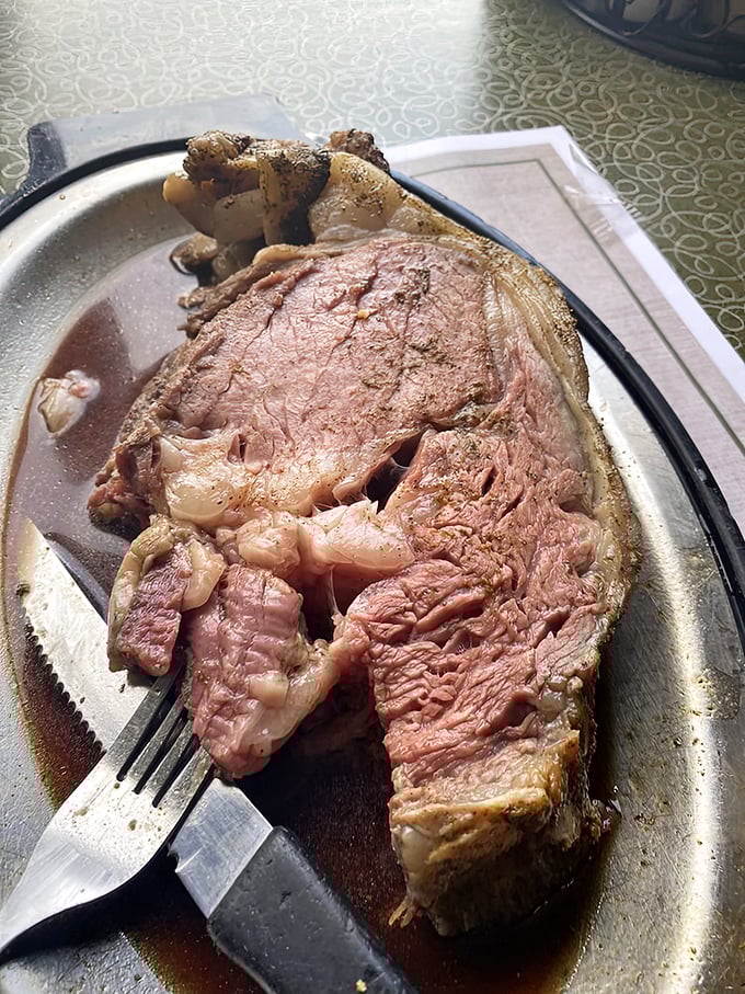 Prime rib so tender you could cut it with a harsh glance, glistening with savory jus that would make vegetarians question their life choices.