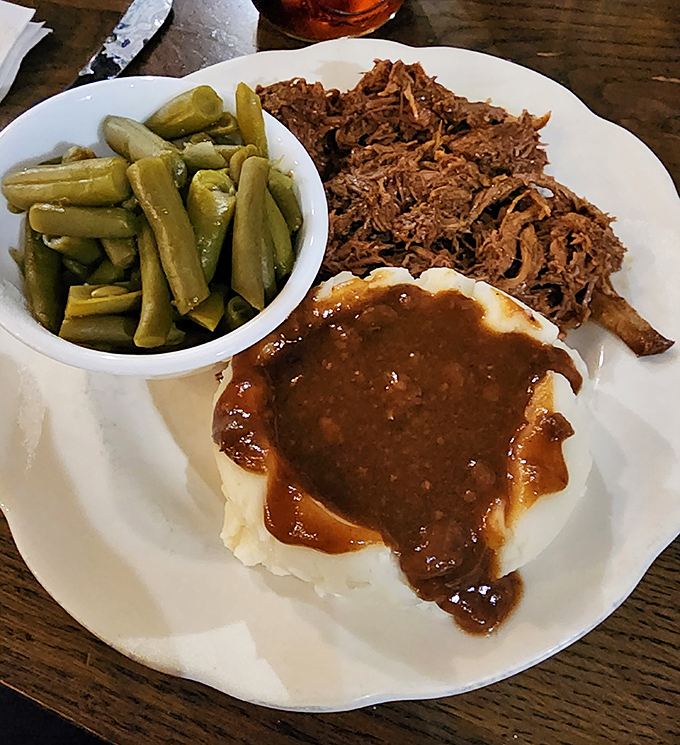 A plate that grandma would approve of&mdash;tender roast beef, green beans, and mashed potatoes smothered in gravy that could solve world peace.