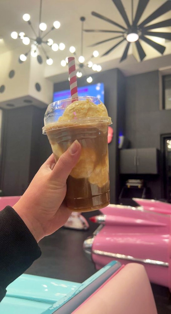That's not just a shake&mdash;it's a time machine in a cup, complete with old-school striped straw and the pink booths that would make the Fonz feel right at home.