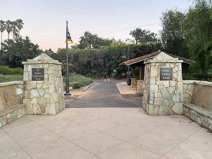 Rotary Community Park's stone entrance promises adventures beyond. Like the wardrobe to Narnia, but with better weather.