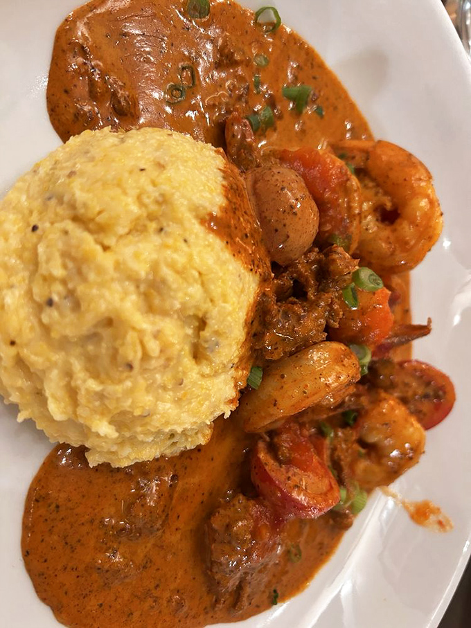 Southern comfort meets coastal luxury. This shrimp and grits dish with its velvety sauce is the culinary equivalent of a warm hug on a cool evening.