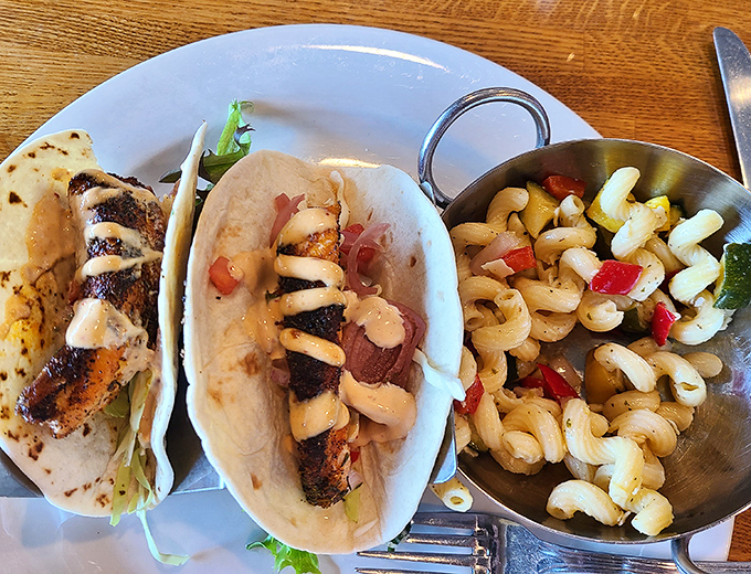 Salmon tacos that make you question why you ever settled for ground beef, served with a pasta salad that's having its own little flavor party.
