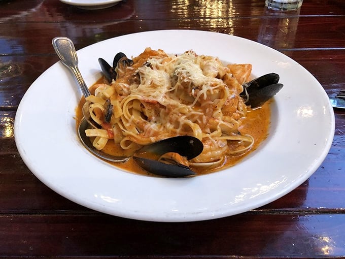 Seafood pasta that makes you question why you'd ever order anything else&mdash;tender noodles swimming with mussels in a sauce worth bottling and taking home.