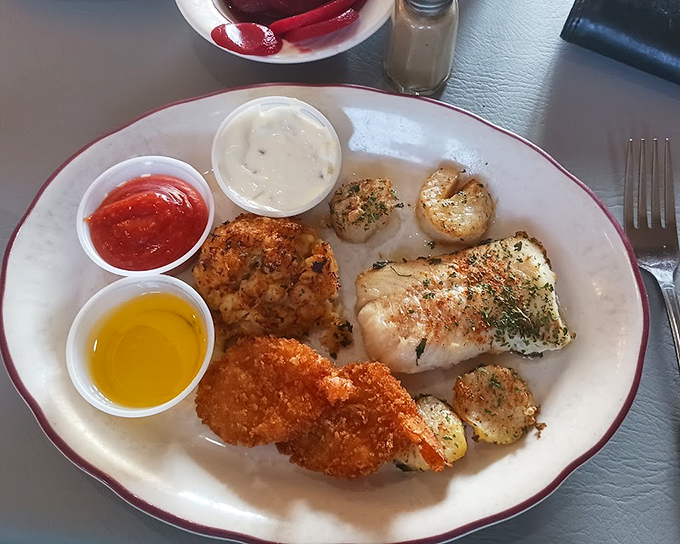 Seafood nirvana! The golden-brown crab cake steals the show, but those scallops and fish deserve their own standing ovation.