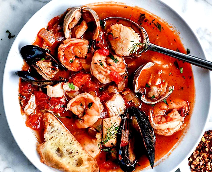 The cioppino arrives like a seafood block party where everyone's invited&mdash;shrimp, mussels, and fish all swimming in tomato broth glory.